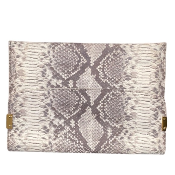 Bags | Stuart Weitzman Snake Skin Print Clutch | Poshmark